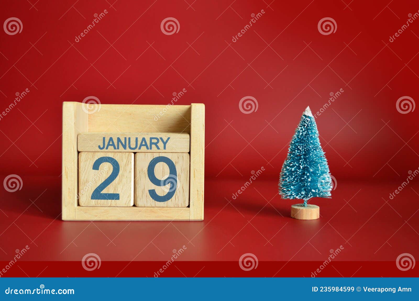 January 29, Calendar Design with Christmas Tree on Red Table Background ...