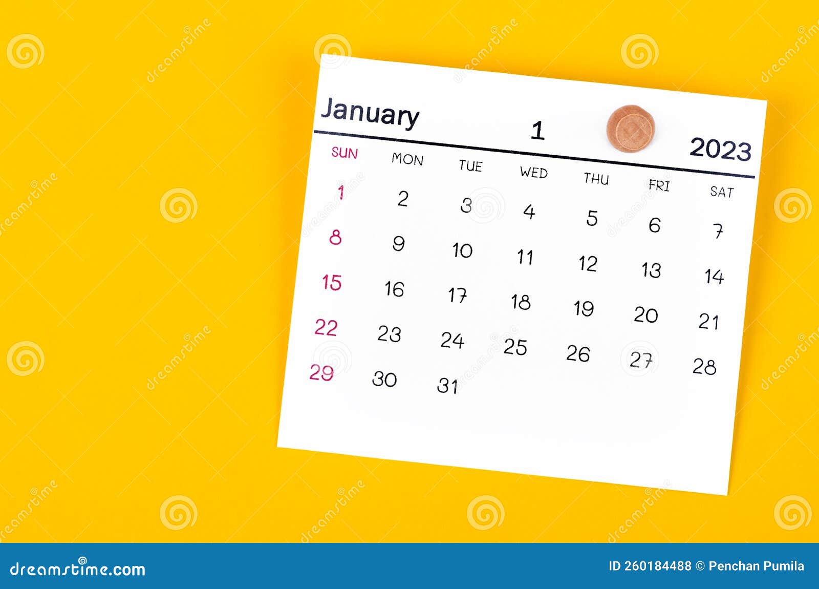 The January 2023 and Wooden Push Pin on Yellow Background Stock Photo ...