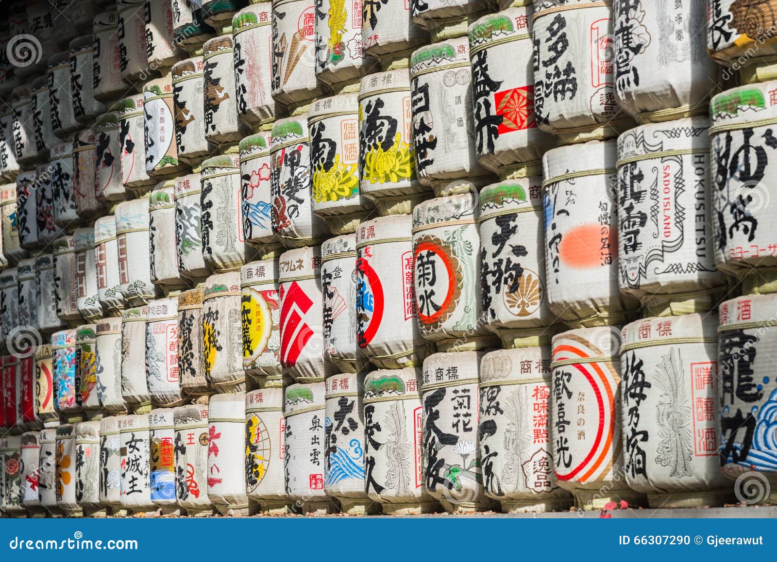 Japanese Barrels of Sake Wrapped in Straw Stacked on Shelf Editorial ...