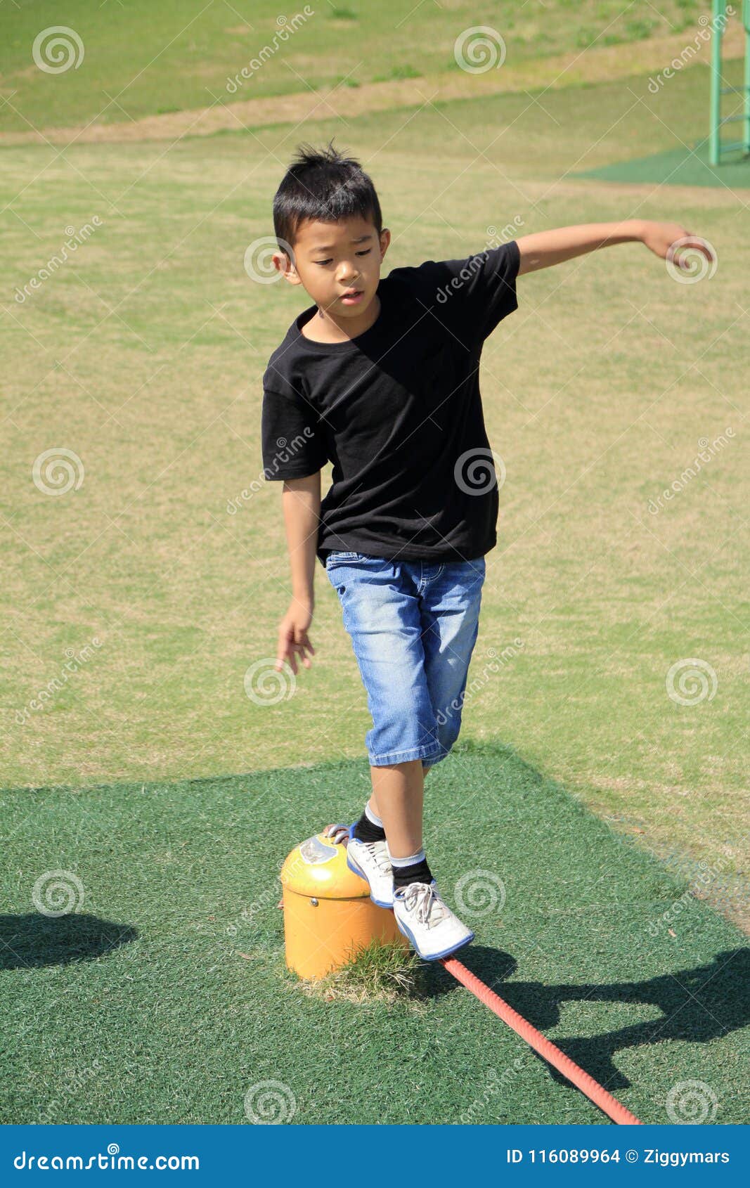Japanese Boy on the Balance Beam Stock Photo - Image of eight, primary ...