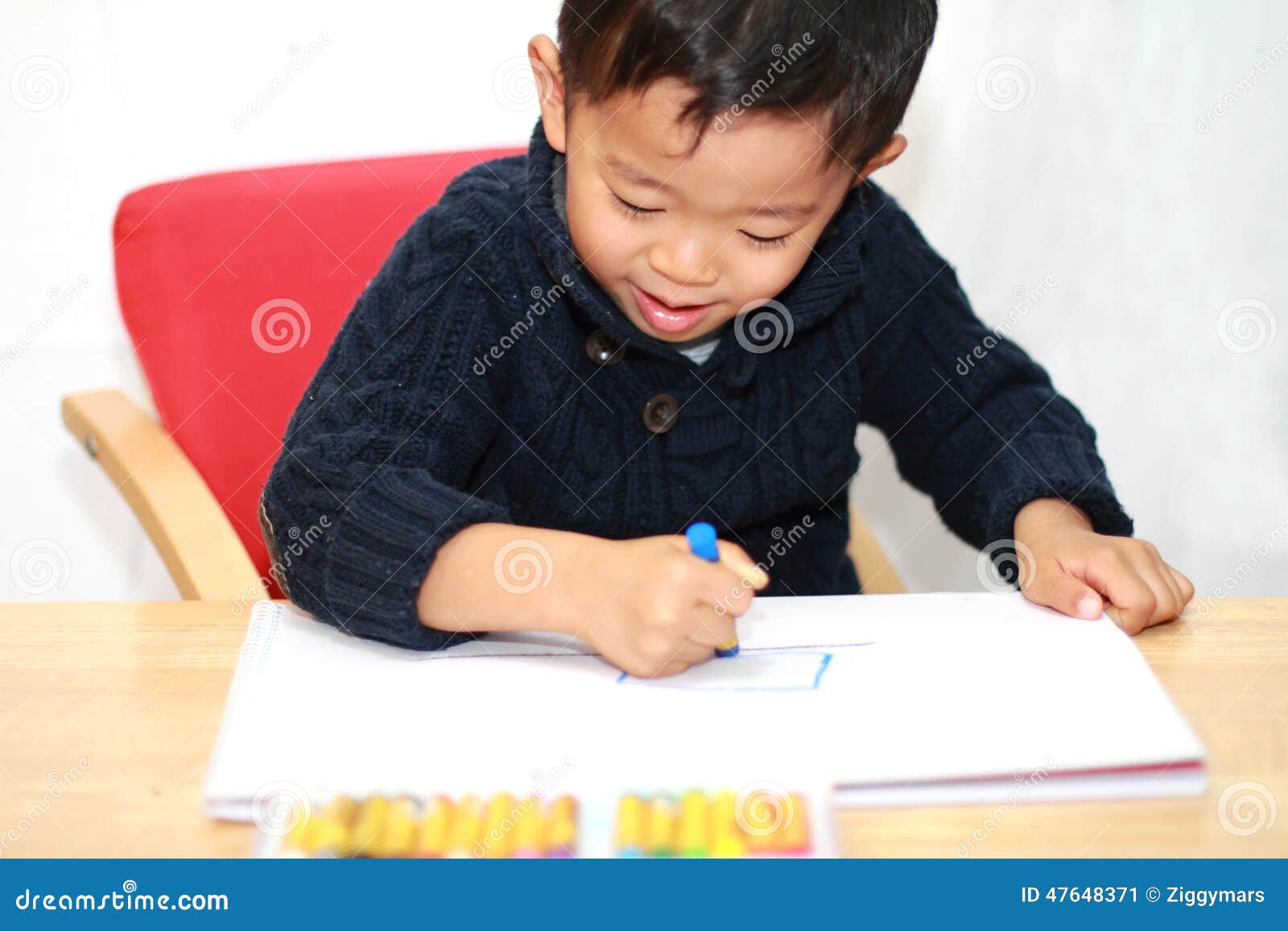 Japanese Boy Drawing a Picture Stock Image - Image of desk, paper: 47648371
