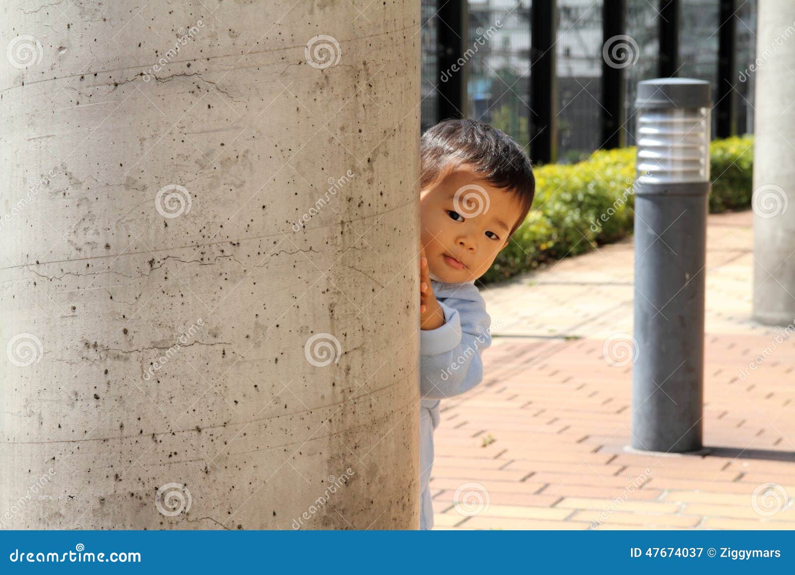 Japanese Boy Hiding Behind the Pole Stock Image - Image of pillar ...