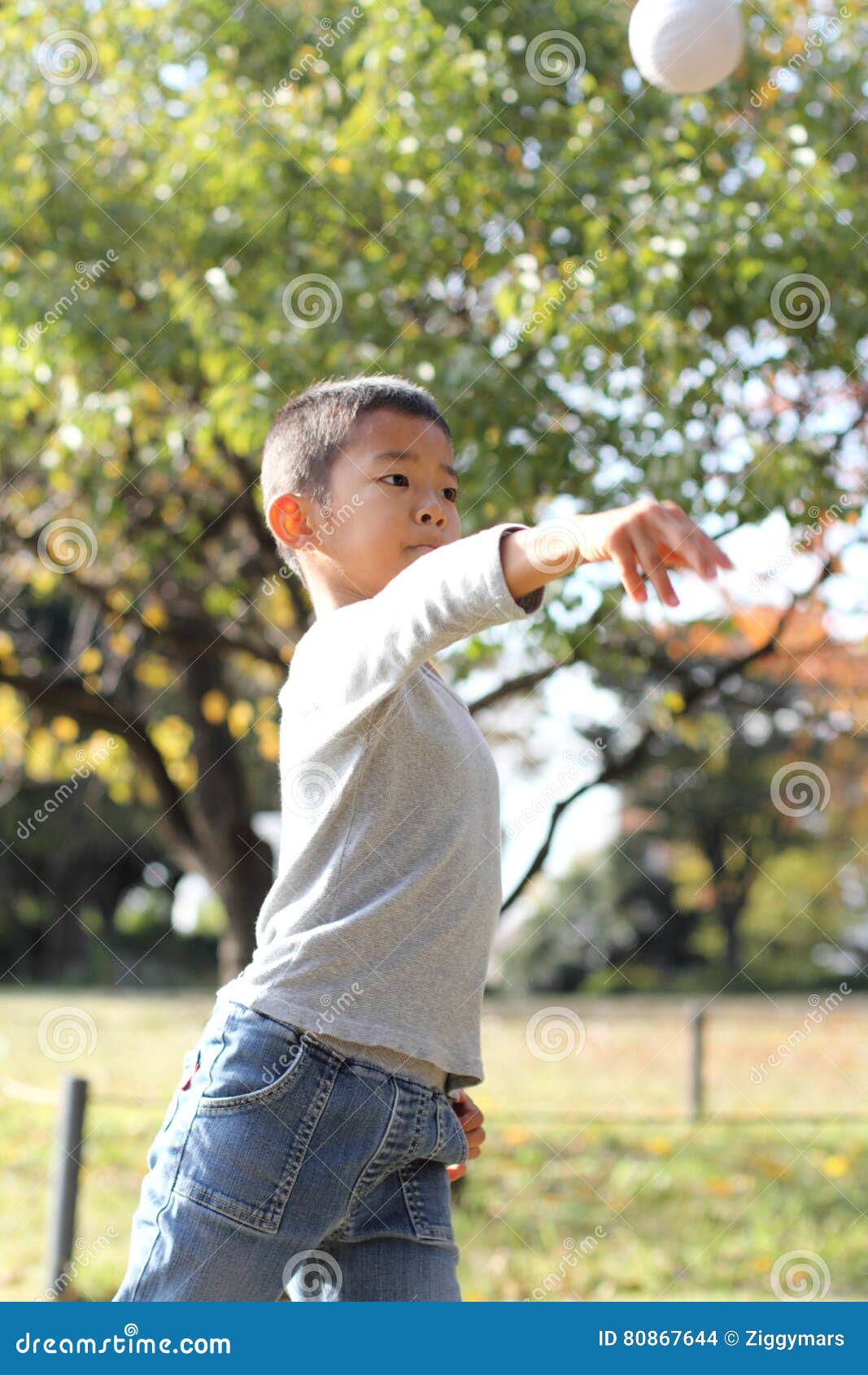 Japanese boy playing catch stock photo. Image of male - 80867644