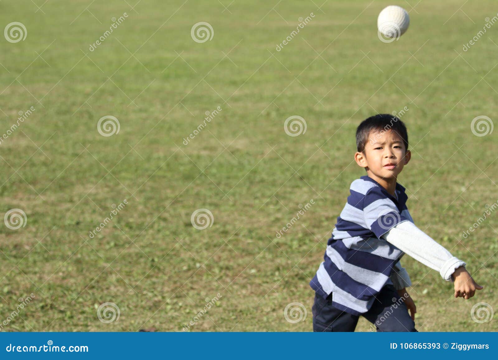 Japanese boy playing catch stock image. Image of cute - 106865393