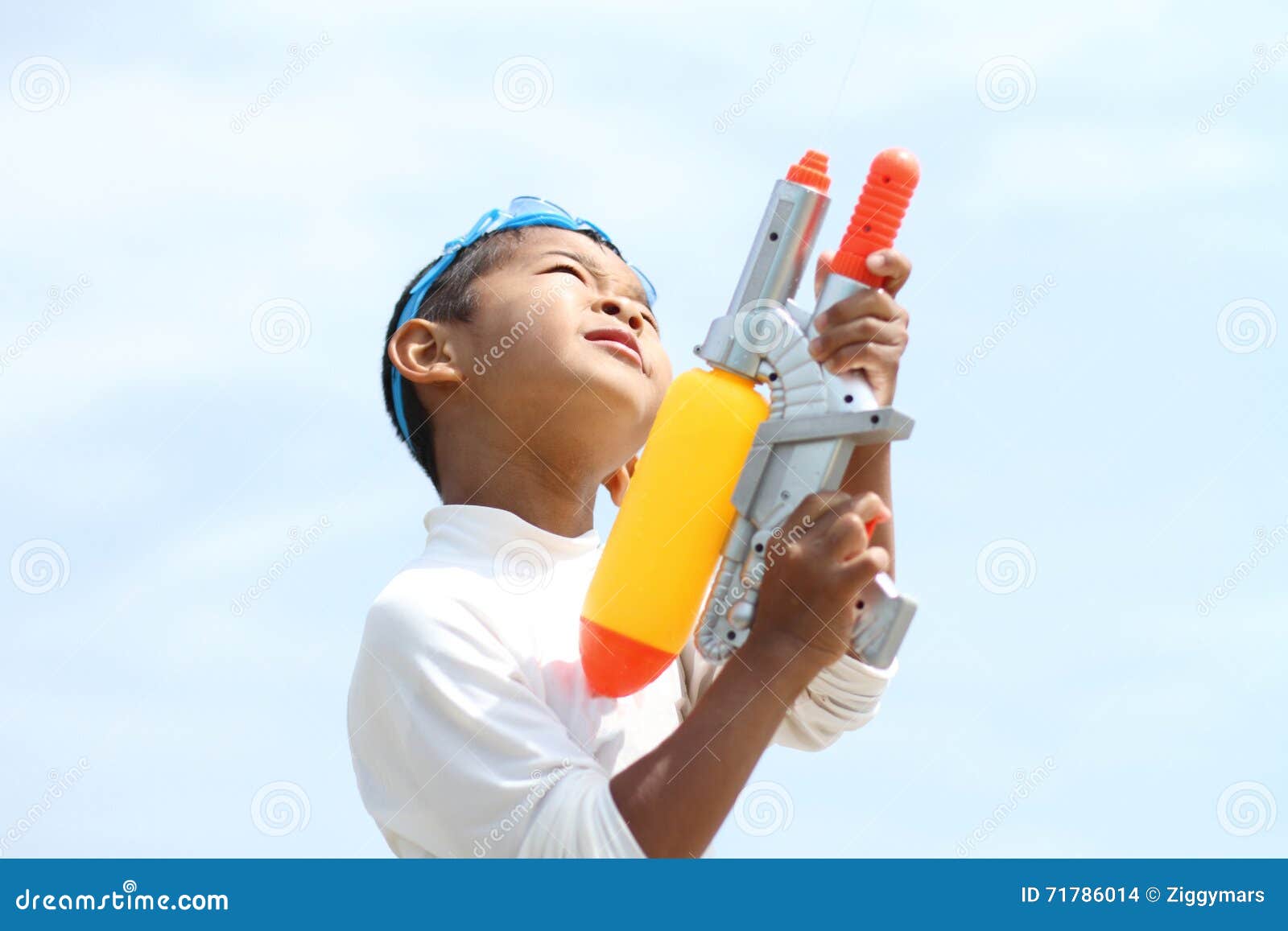 Japanese Boy Playing with Water Gun Stock Photo - Image of person ...
