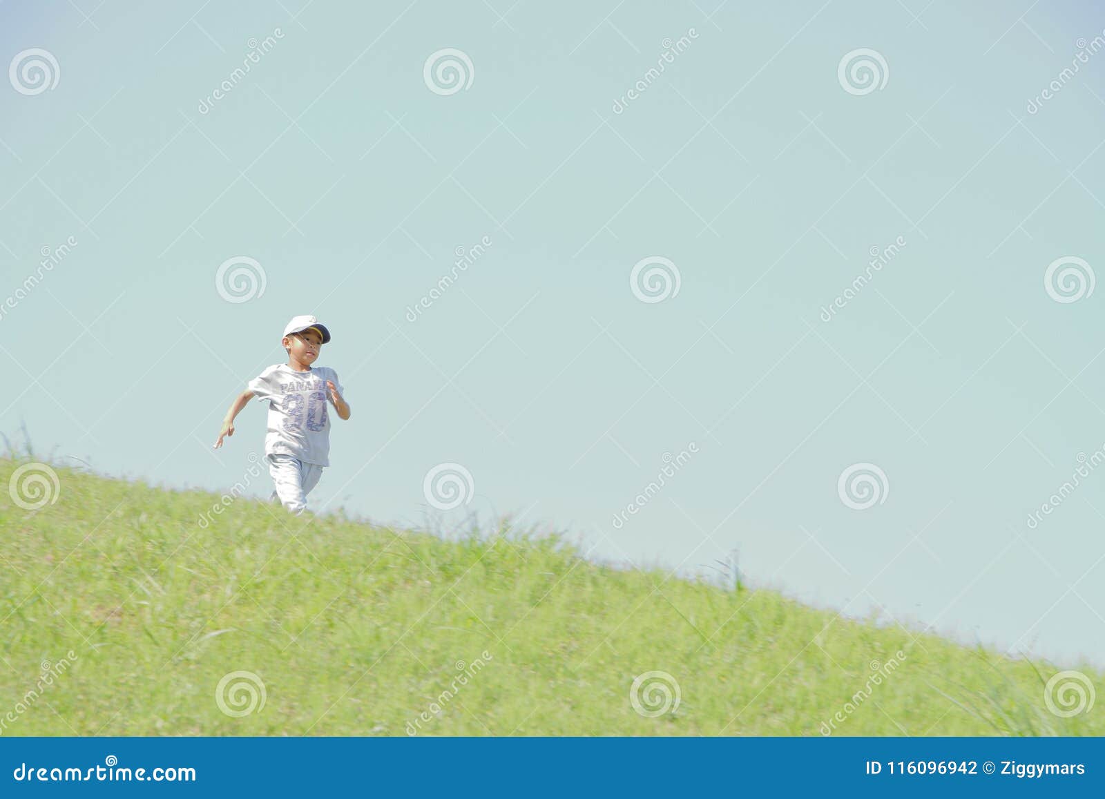 Japanese Boy Running Down on the Hill Stock Photo - Image of grader ...