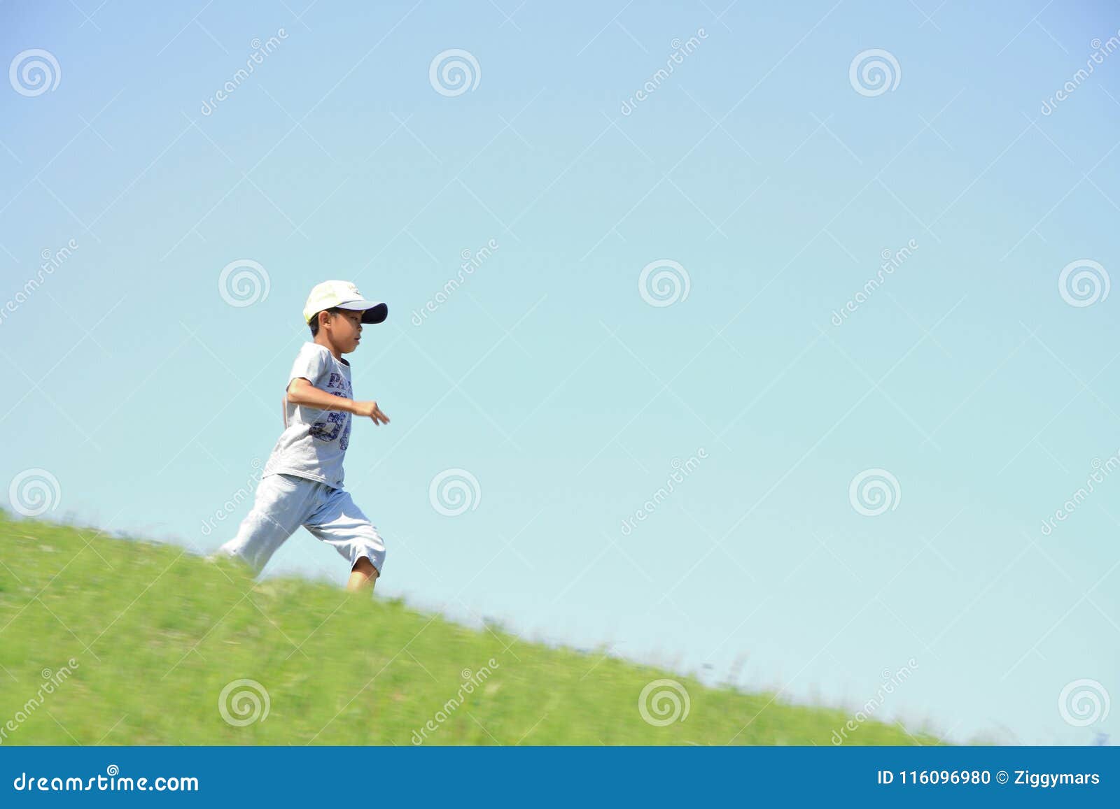 Japanese Boy Running Down on the Hill Stock Photo - Image of elementary ...