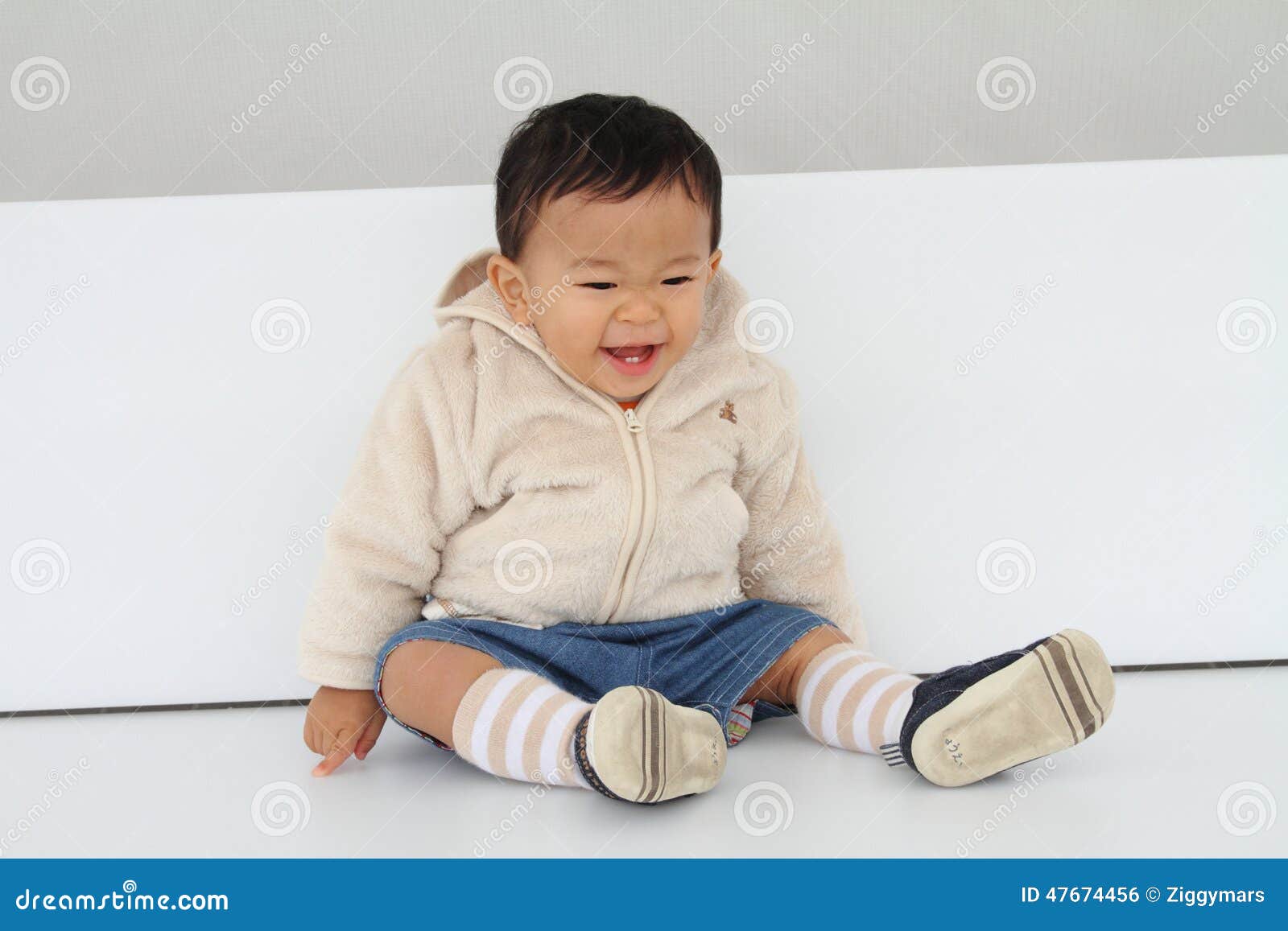 Japanese Boy Seating on the White Bench Stock Photo - Image of smile ...
