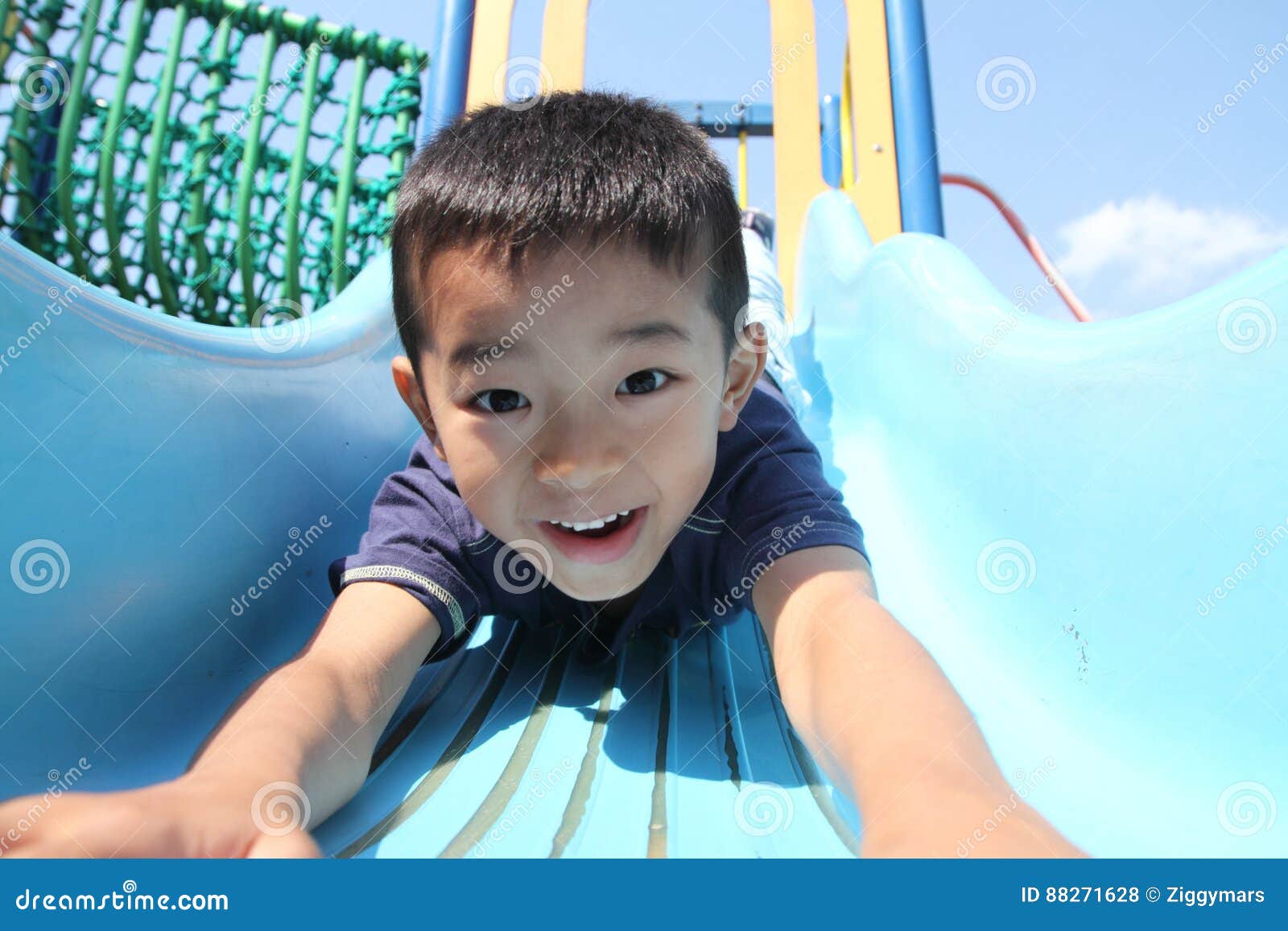 Japanese Boy On The Slide Stock Photography | CartoonDealer.com #49603238