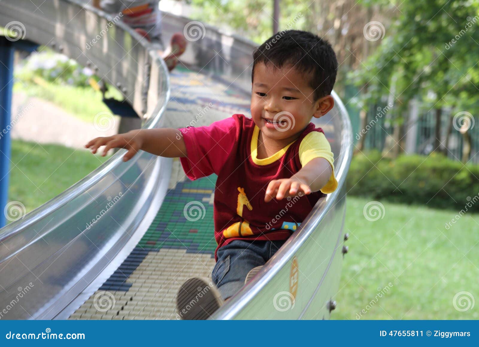 Japanese Boy On The Slide Stock Photography | CartoonDealer.com #49603238