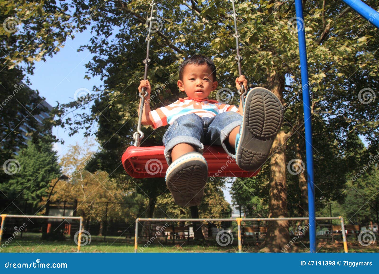 Japanese boy on a swing stock photo. Image of swing, park - 47191398