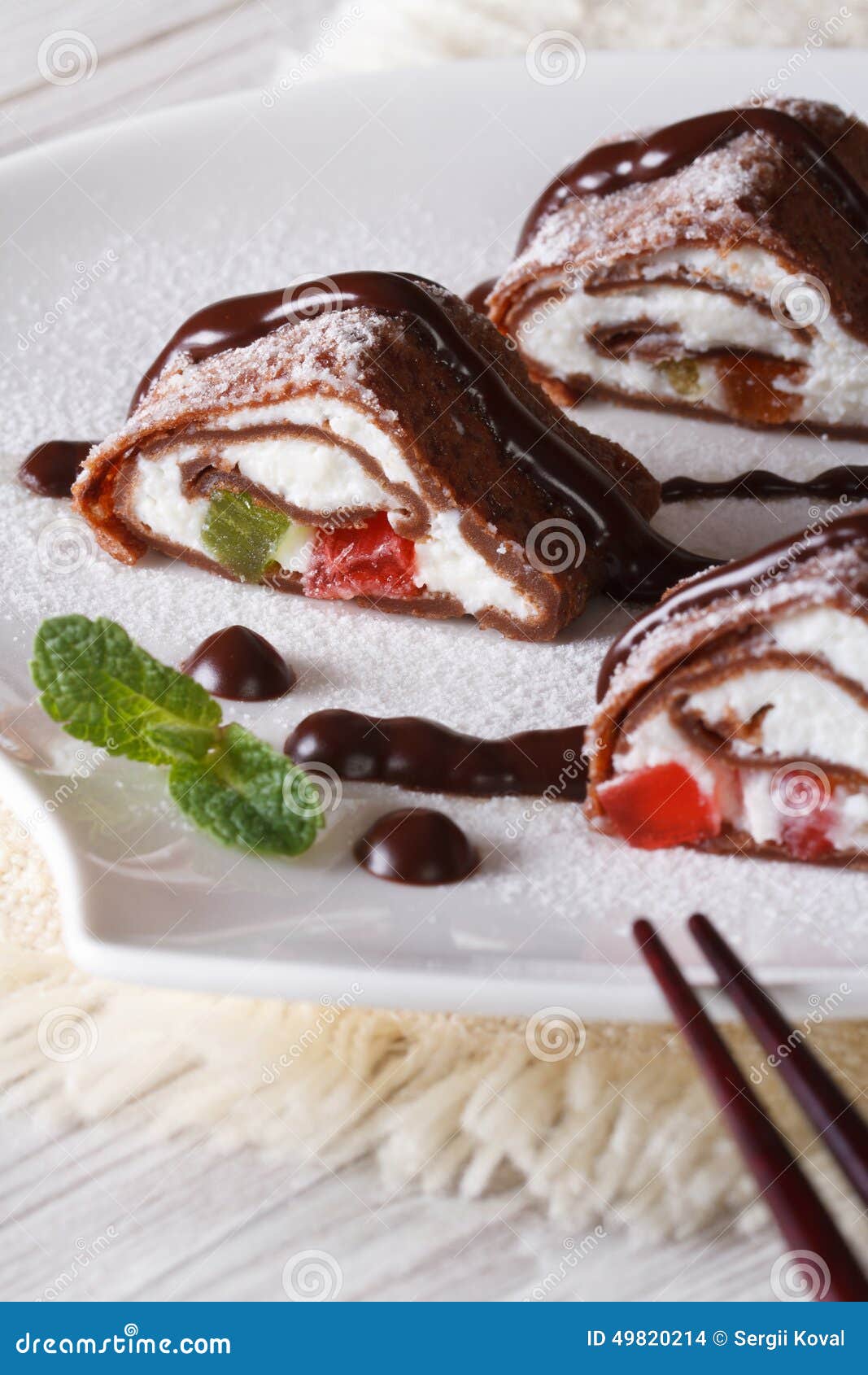 Japanese Chocolate Crepe Rolls with Cheese Close-up. Vertical Stock ...