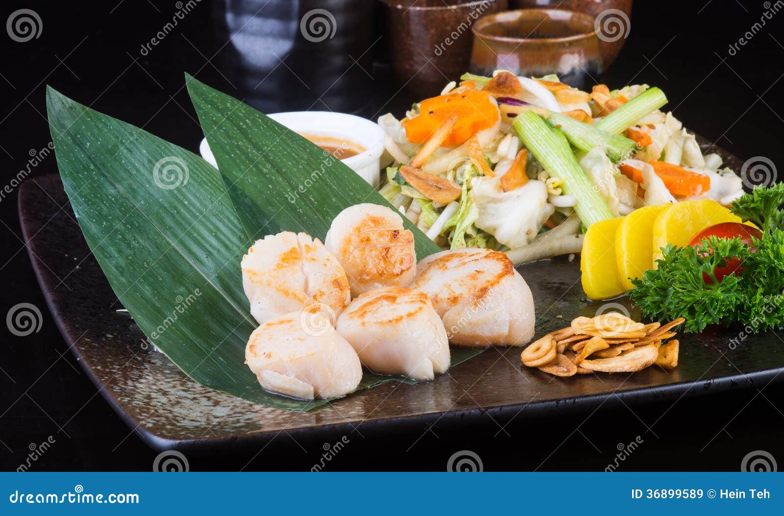 Japanese Cuisine. Grilled Shell Fish on the Background Stock Image ...
