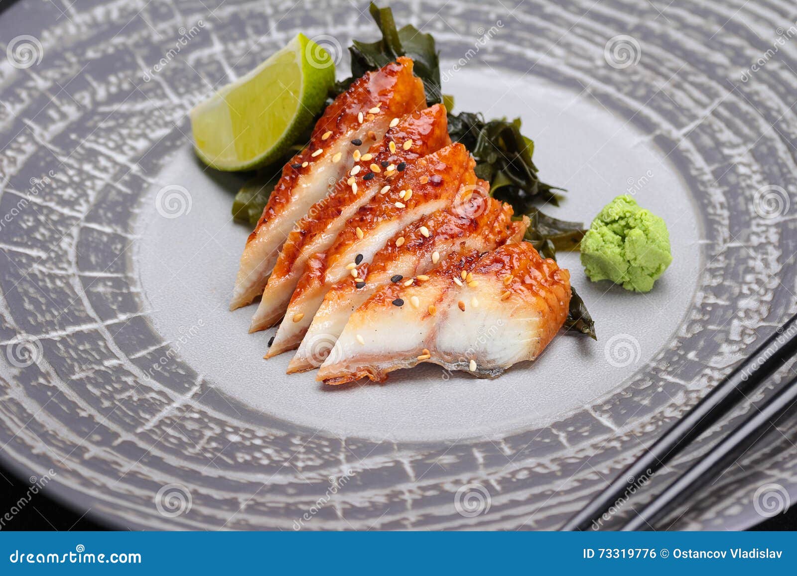 Japanese Cuisine. Sushi on a Round Stone Plate. Stock Photo - Image of ...