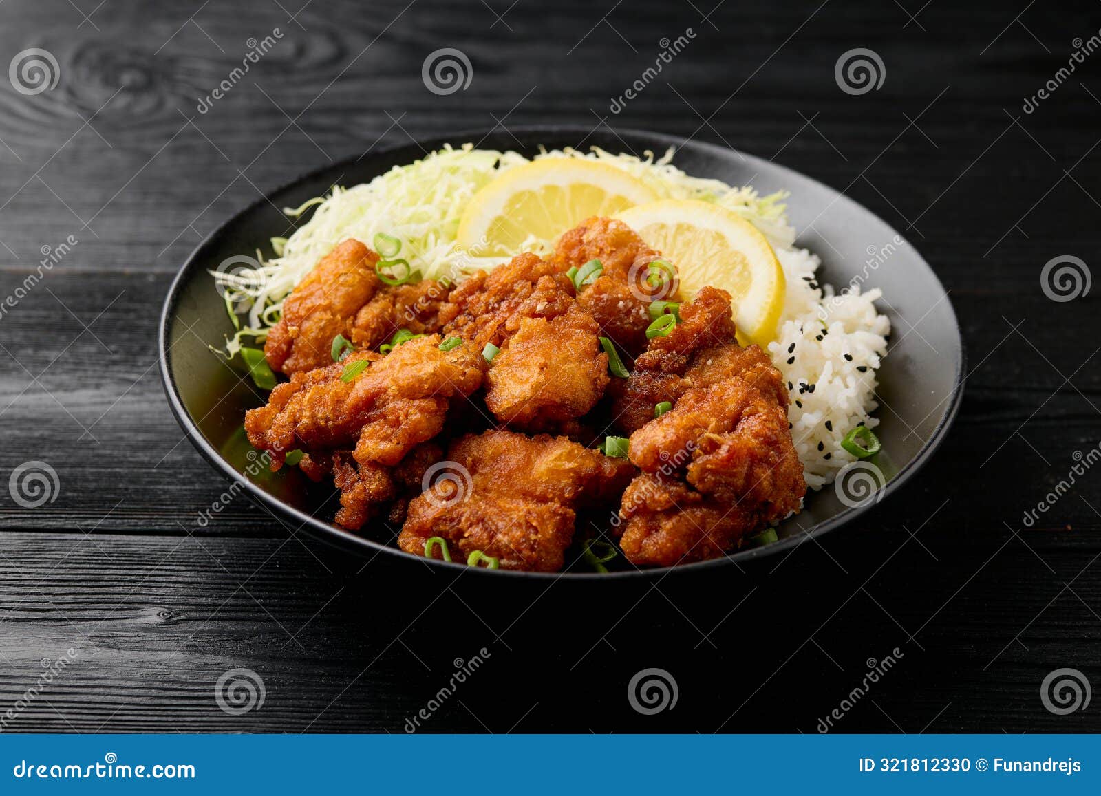 Japanese Fried Crispy Chicken Karaage in Black Bowl with Rice and ...