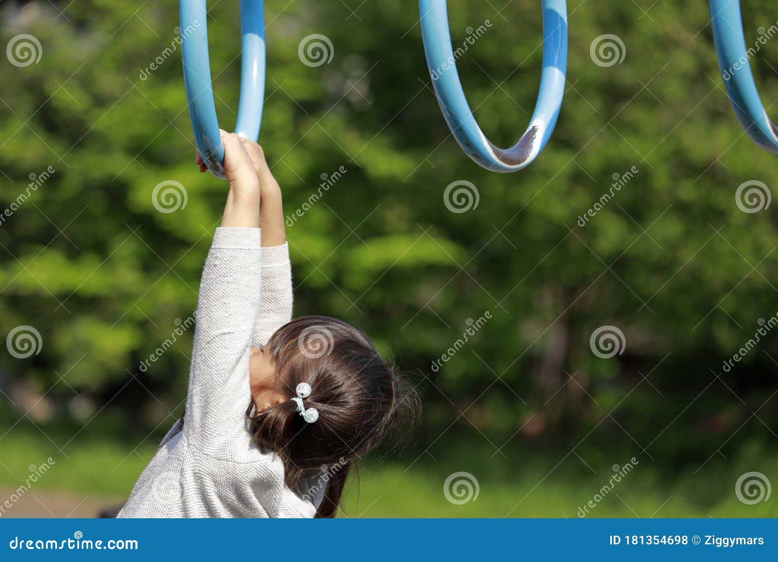 Japanese Girl Playing with a Monkey Bars Stock Photo - Image of play ...