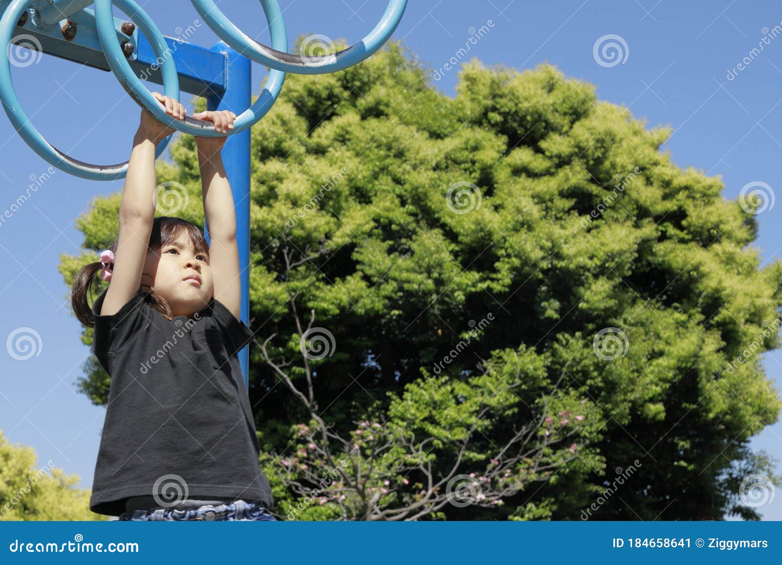 Japanese Girl Playing with a Monkey Bars Stock Image - Image of person ...