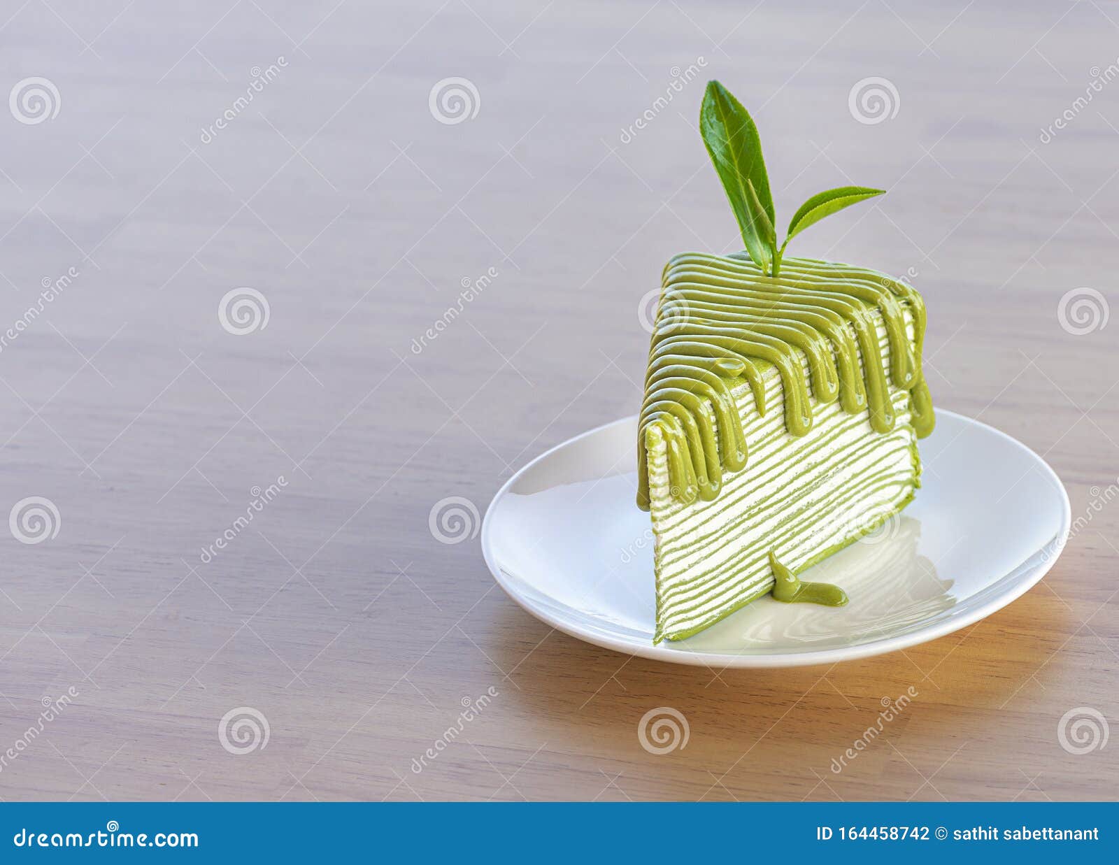 Japanese Matcha Green Tea Cake on a White Plate Placed on the Table ...
