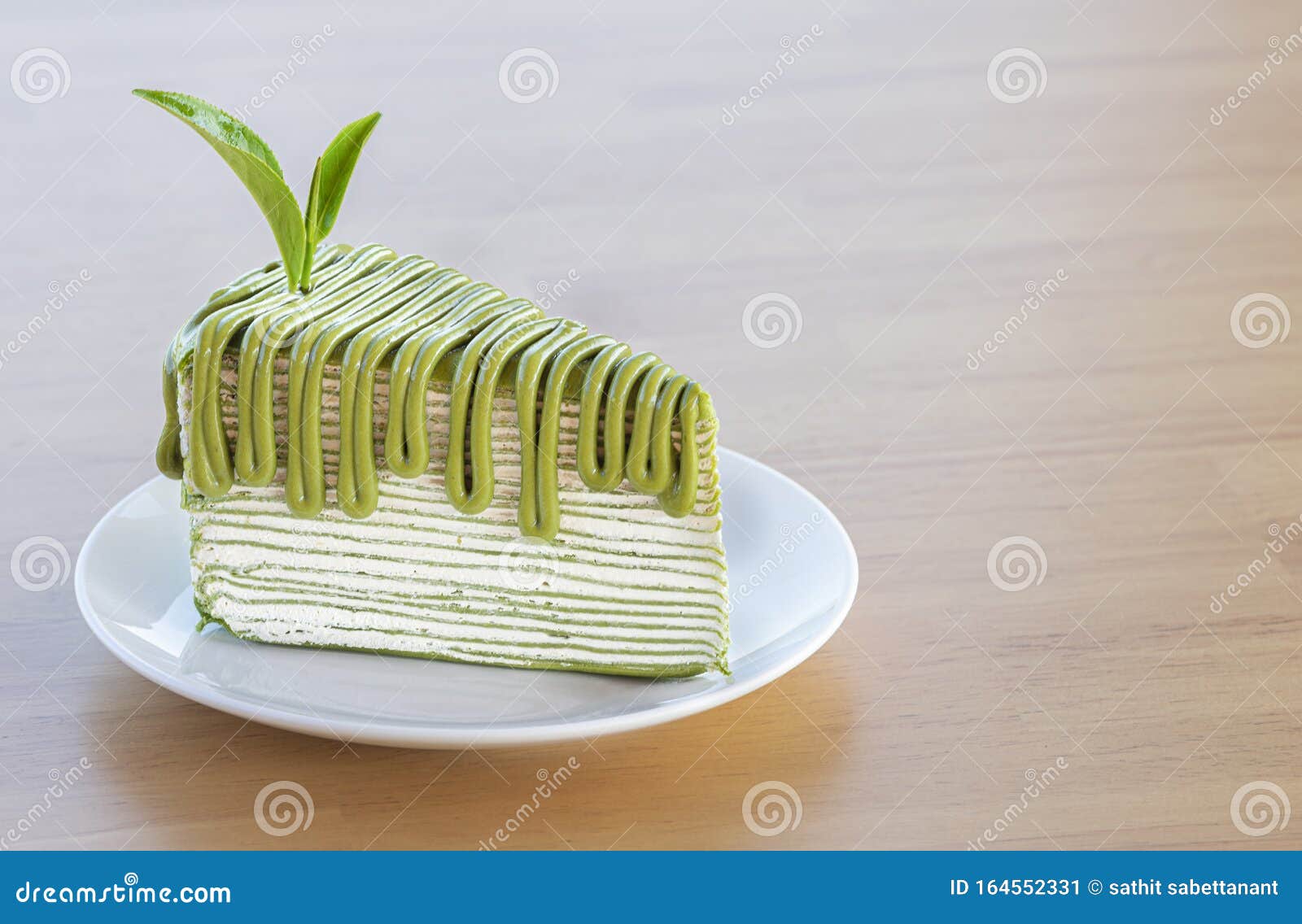 Japanese Matcha Green Tea Cake on a White Plate Placed on the Table ...