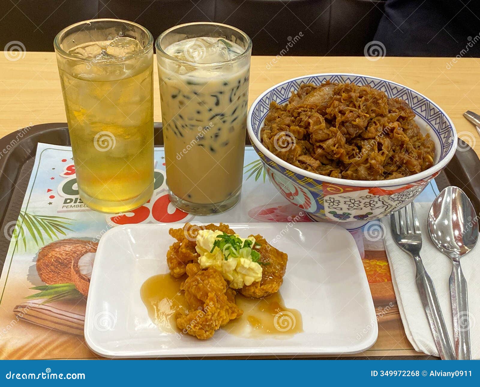 Japanese Meal Set with Gyudon, Fried Chicken, and Drinks Stock Photo ...