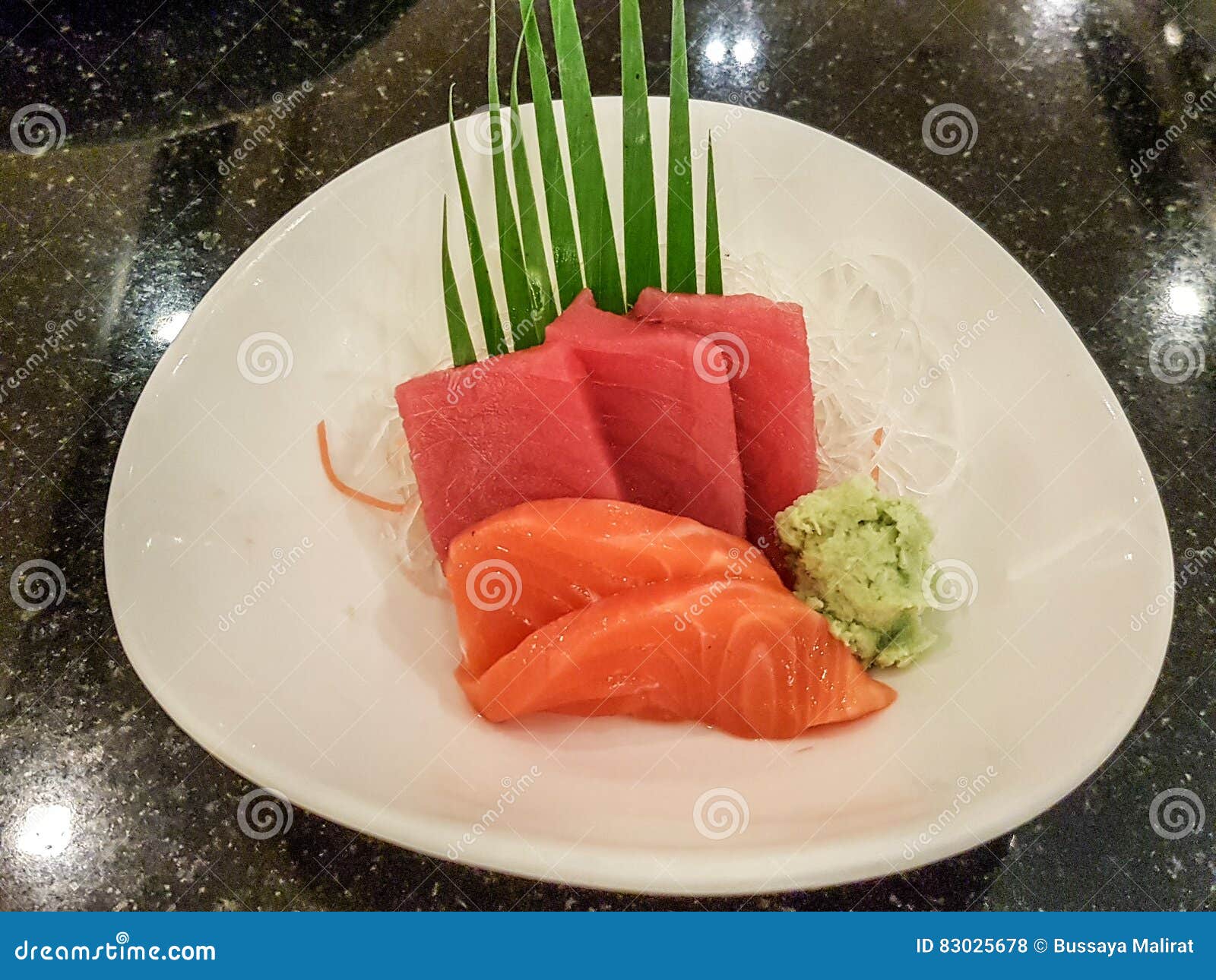 Japanese Raw Fish on White Plate and Marble Black Table. Also Known As ...