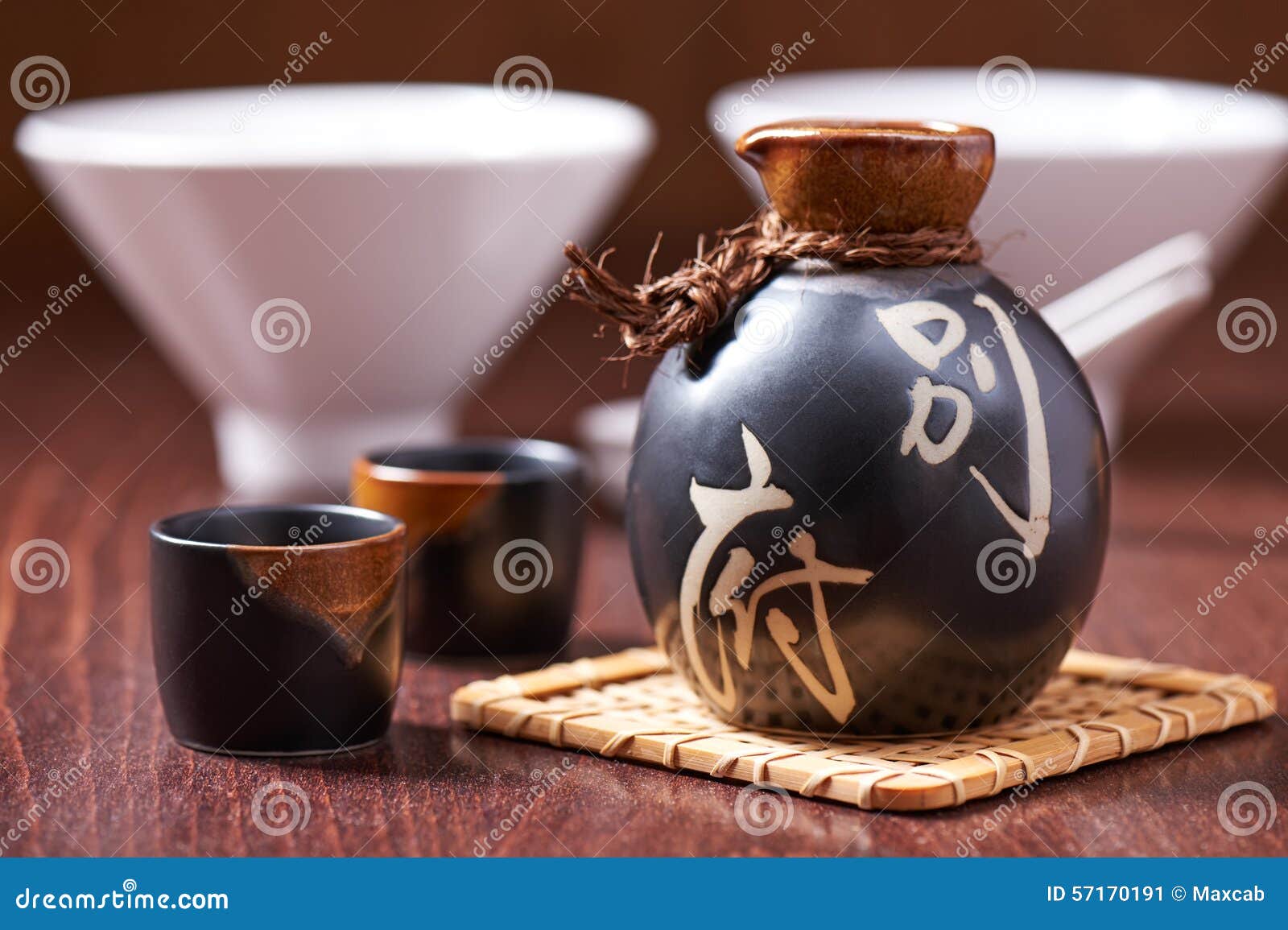 A Japanese Sake Box With A Black Background Stock Photography ...