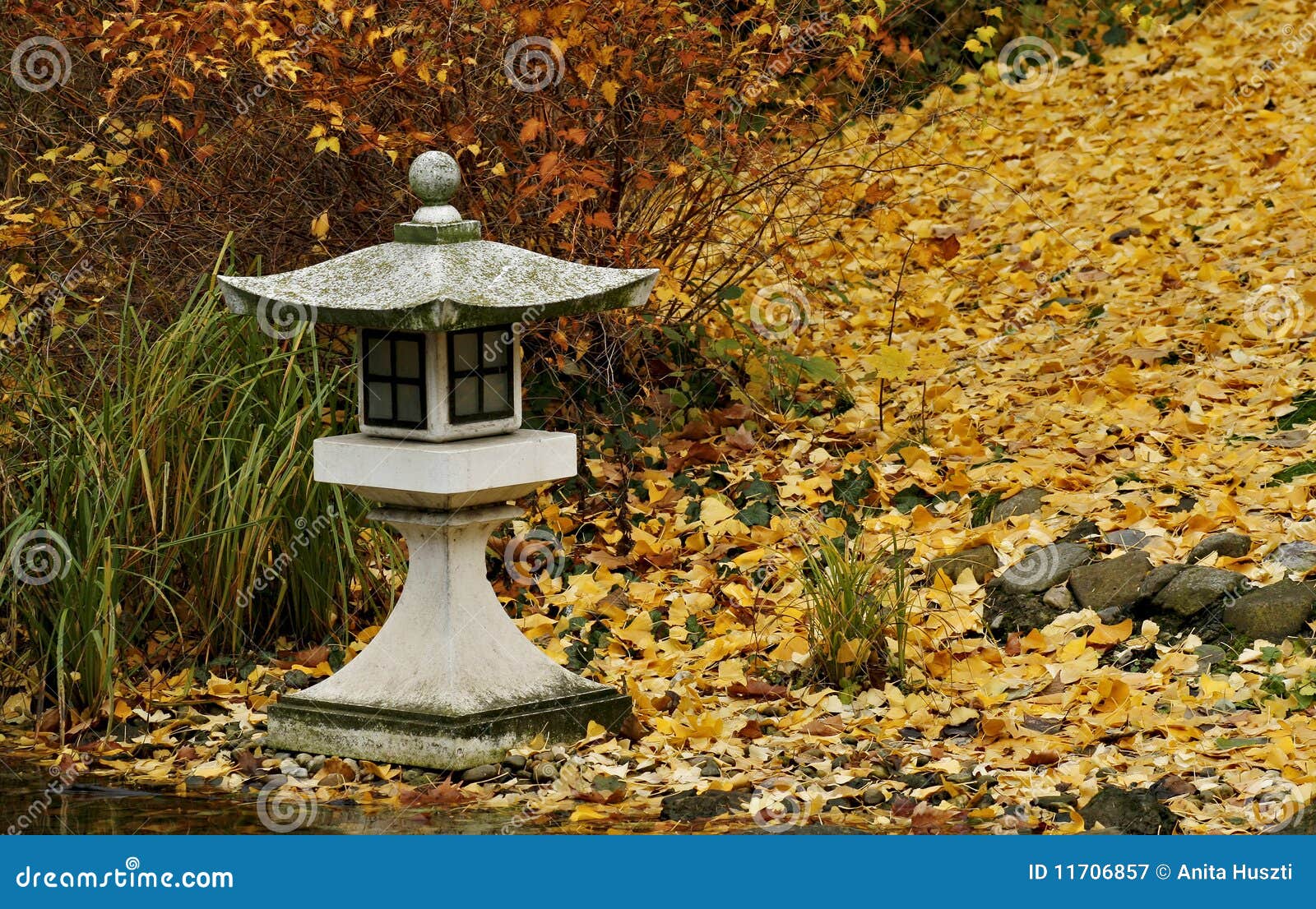 Japanese stone lamp stock image. Image of fall, leaves - 11706857