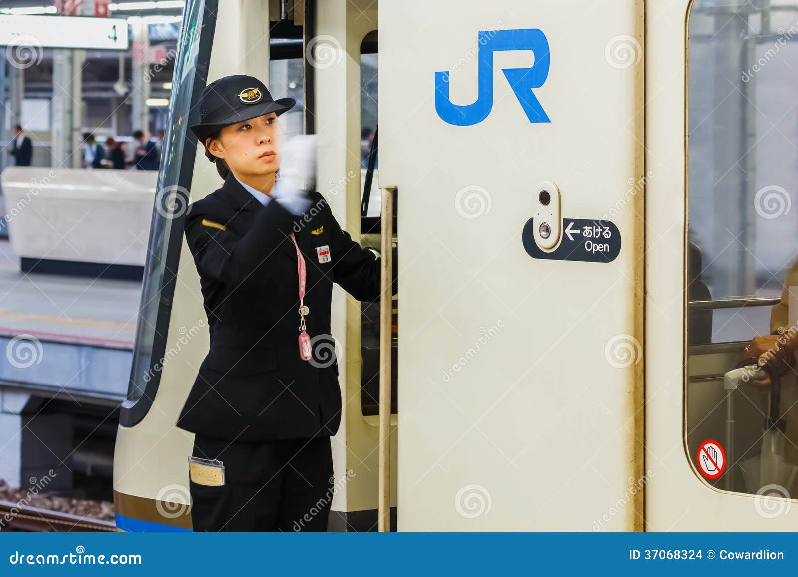 Japanese Train Conductor editorial stock image. Image of track - 37068324