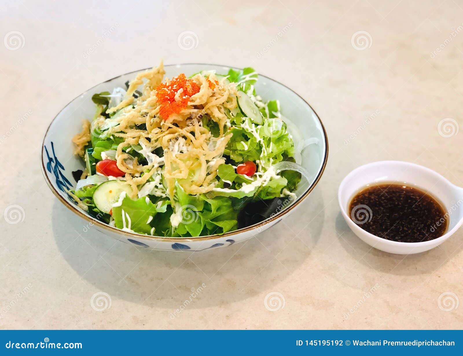 Japanese Vegetable Salad with Little Fried Fish for Diet on the Table ...