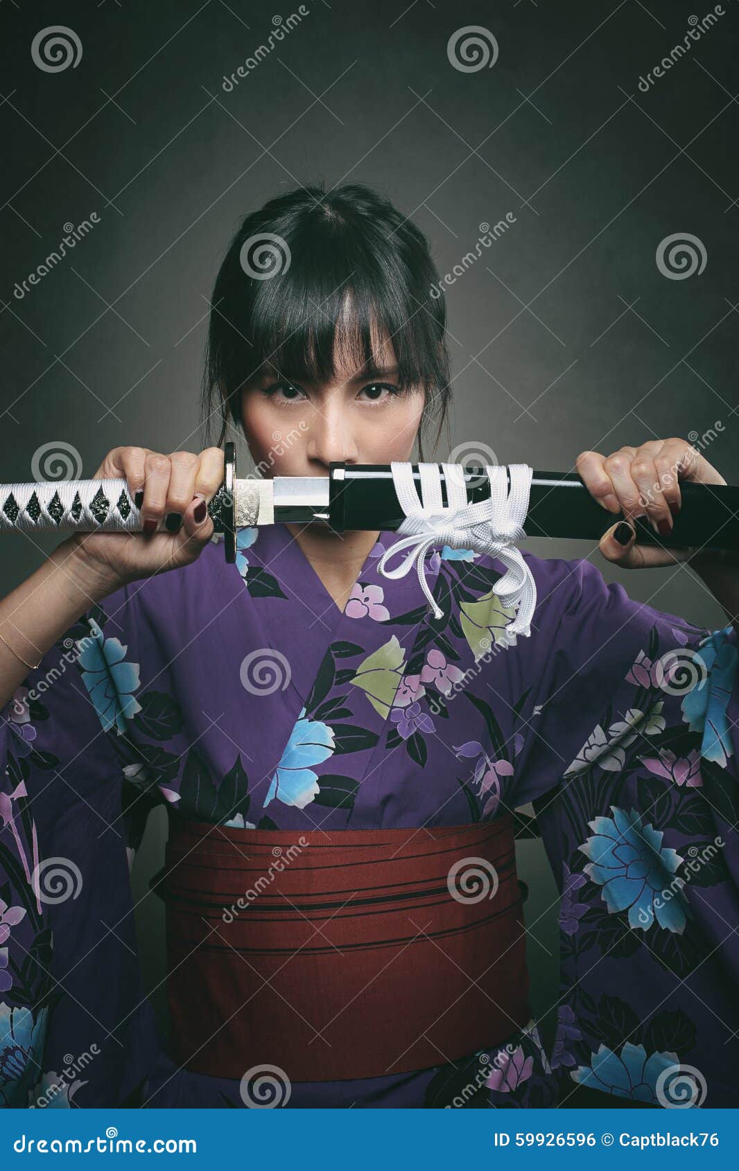 Japanese Woman with Samurai Sword Stock Photo - Image of expression ...