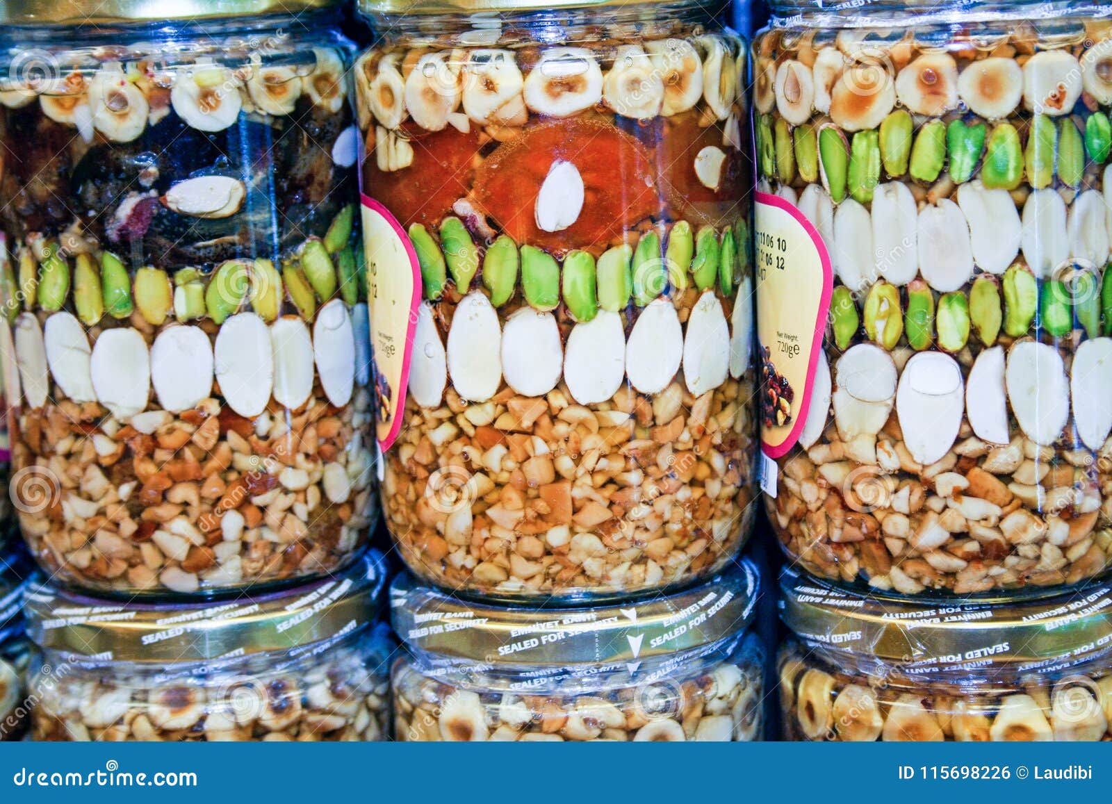 Jar of Assorted Nuts in Honey Stock Photo - Image of typical, people ...