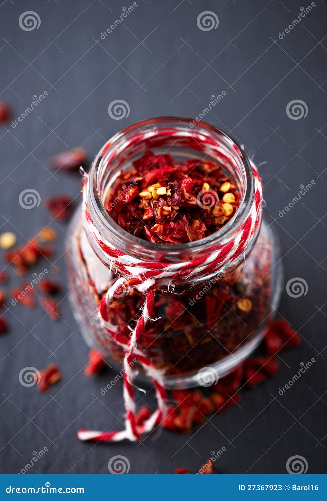 Jar of dried chili flakes stock image. Image of seasonings - 27367923