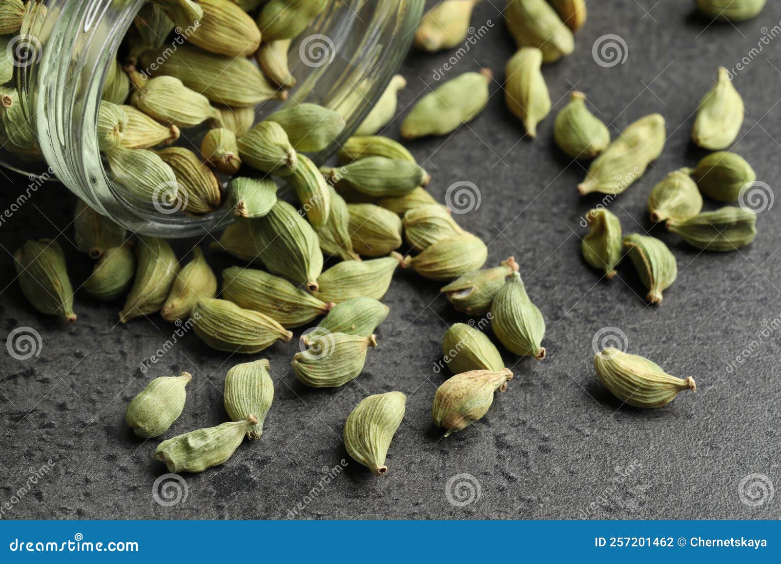 Jar with Dry Cardamom Pods on Dark Grey Table Stock Photo - Image of ...