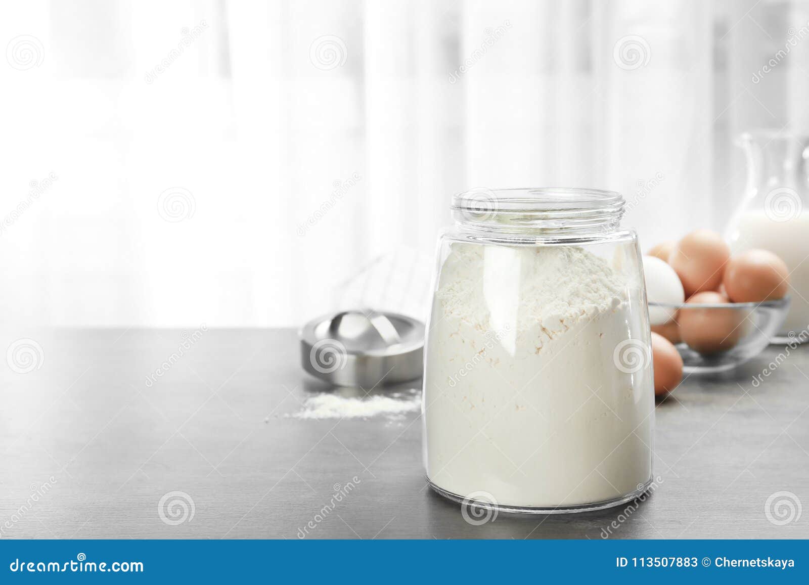 Jar with flour on table stock image. Image of natural - 113507883