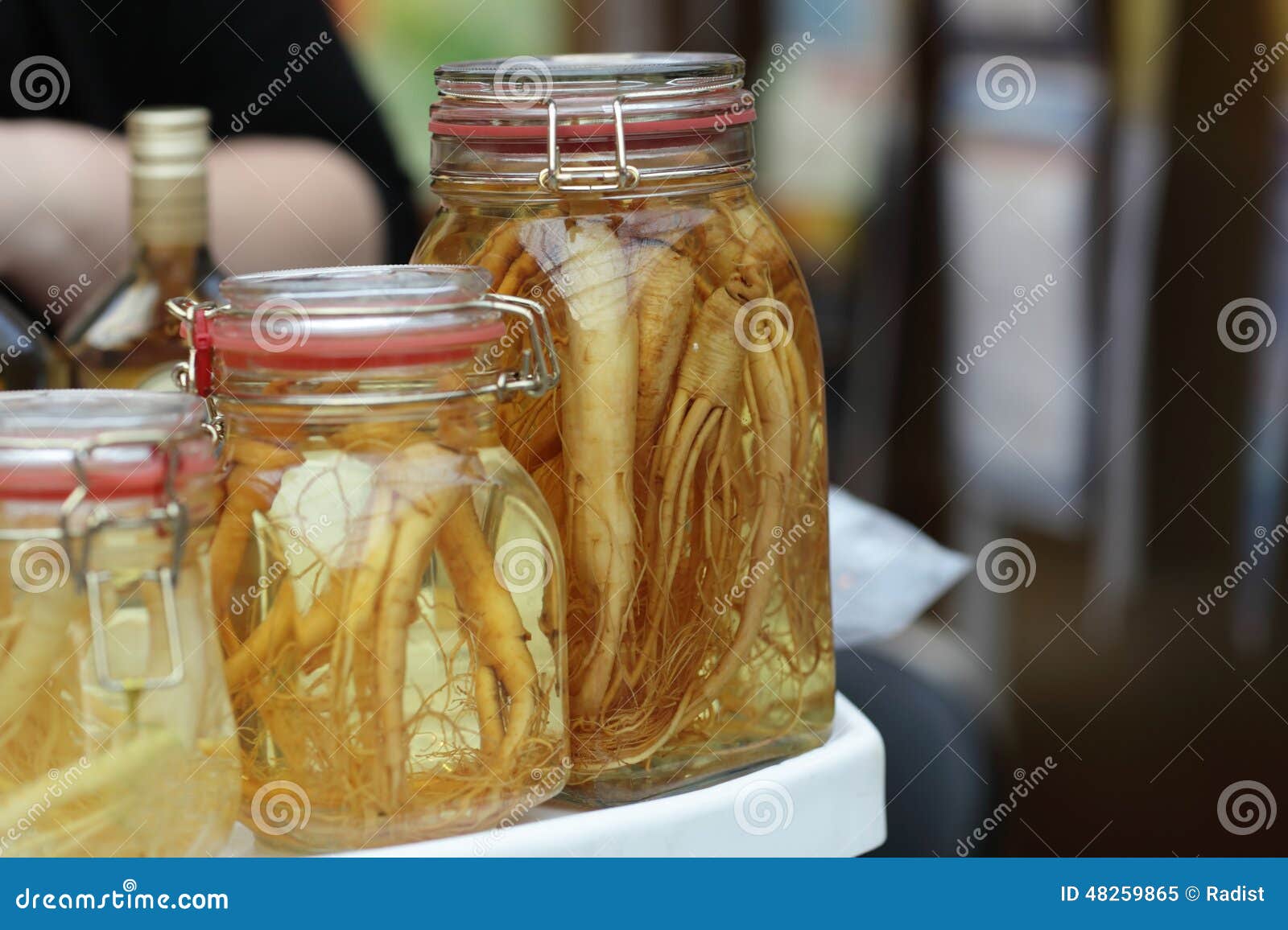 Jar with ginseng root stock image. Image of food, healthy - 48259865