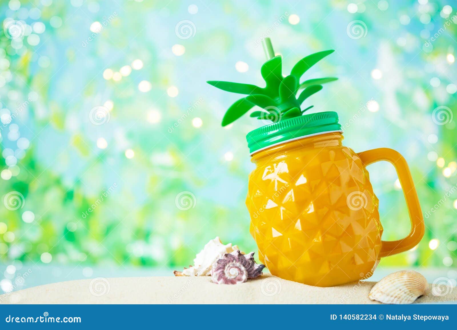 Jar of Pineapple Juice on the Sand with Shells on the Summer Sea ...