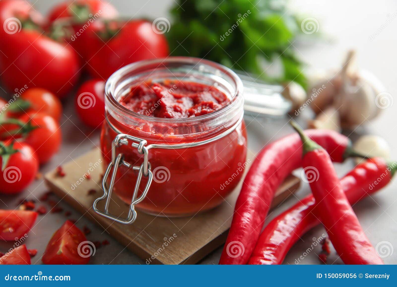Jar with Red Sauce and Vegetables on Table Stock Photo - Image of ...