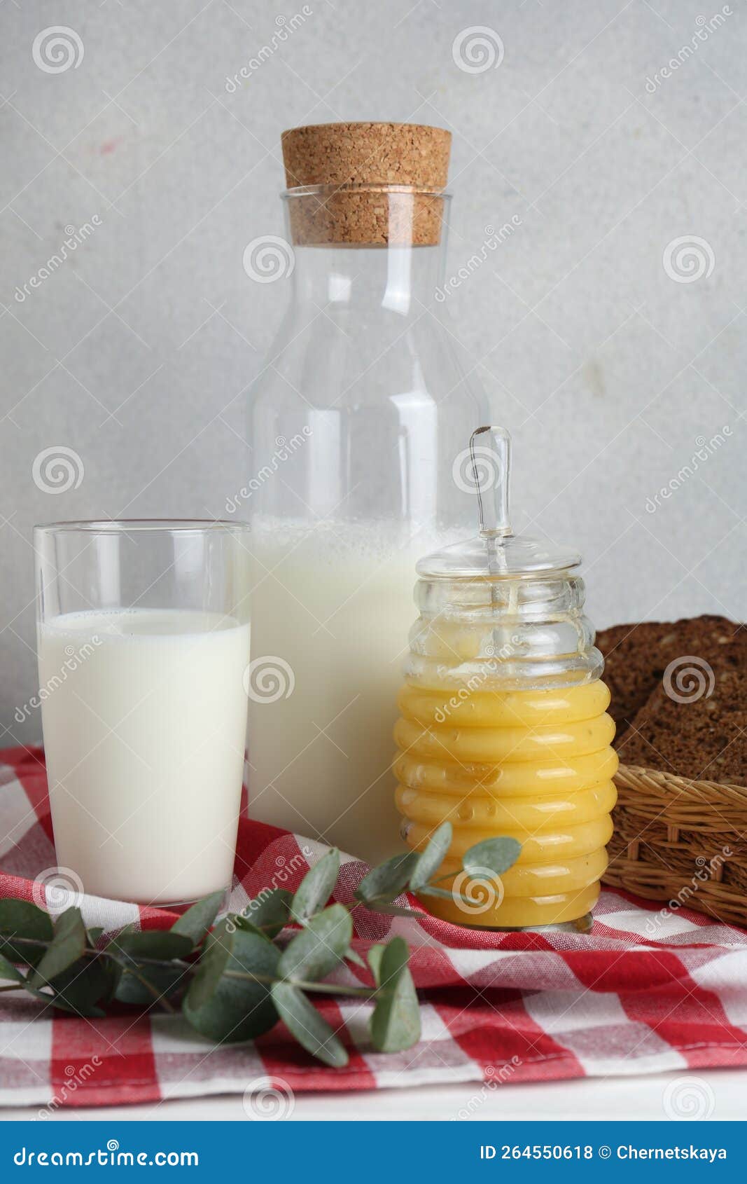 Jar with Tasty Honey, Milk and Bread on Checkered Cloth Stock Photo ...