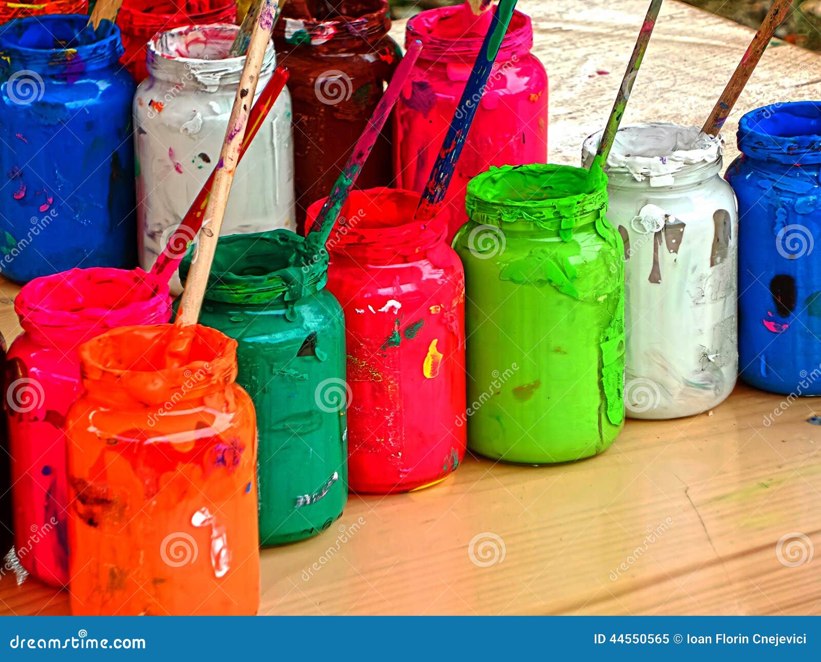 Jars with colors stock image. Image of painter, green - 44550565