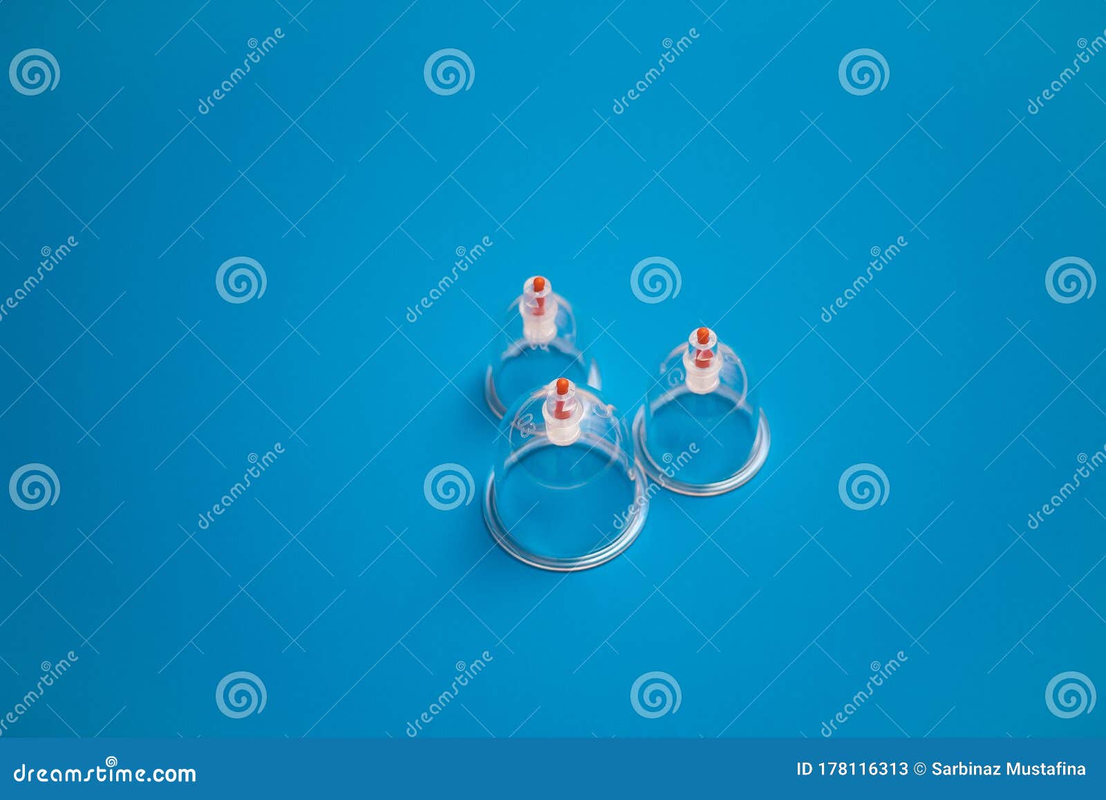 Jars for Hijama. Vacuum Pumps on a Blue Background. Stock Image - Image ...