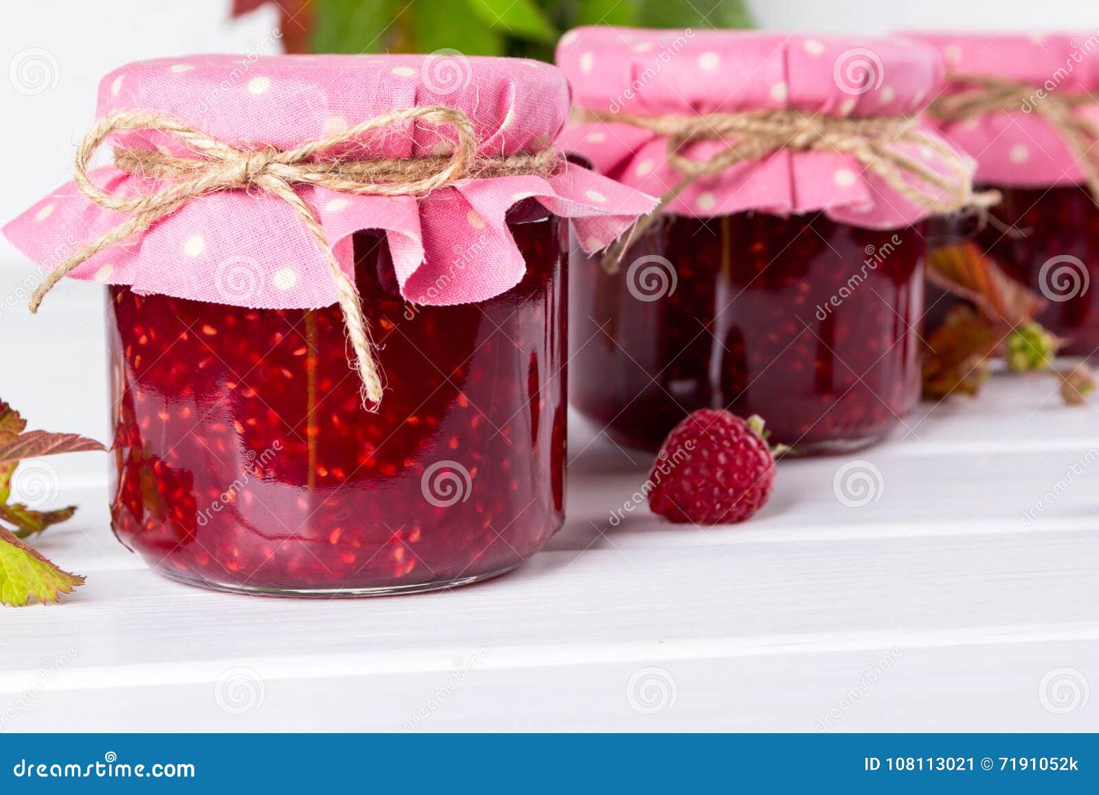 Jars with Raspberry Jam Placed in Rows and Fresh Raspberry Stock Image ...