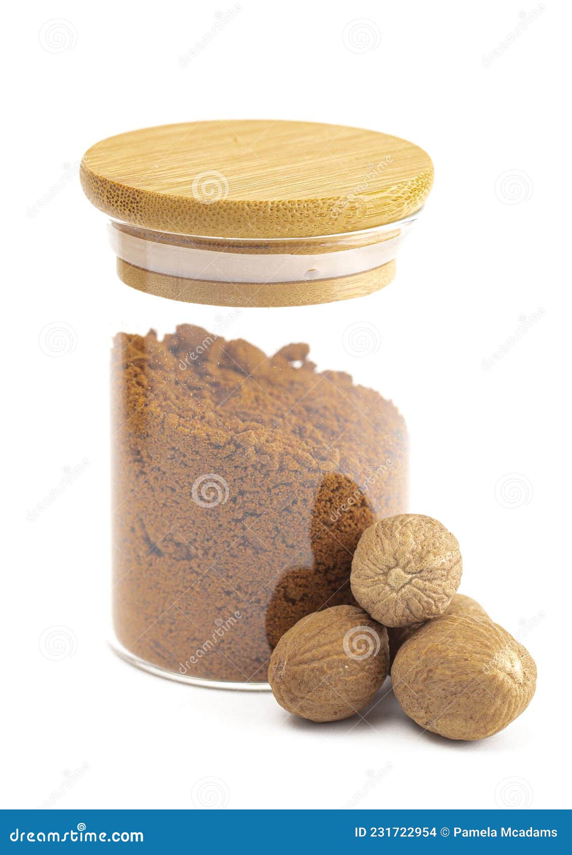 Jars of Whole and Ground Nutmeg on a White Background Stock Photo ...