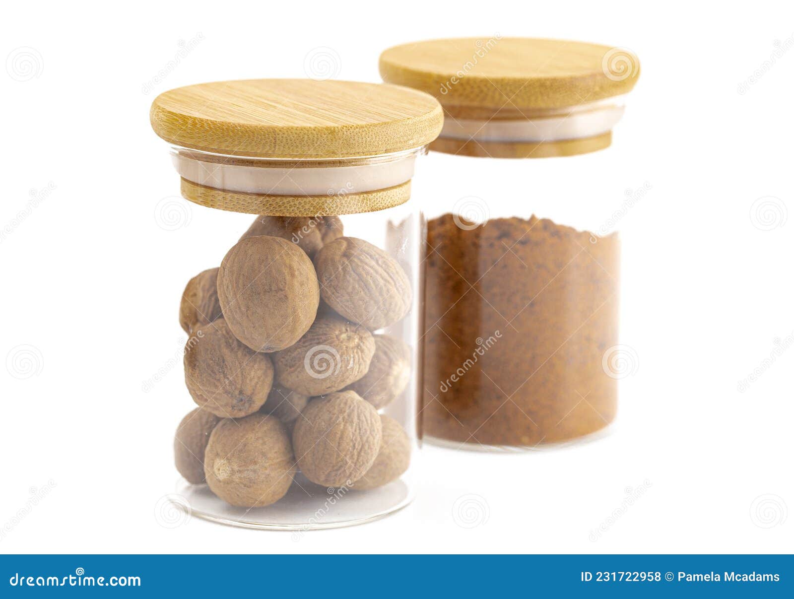 Jars of Whole and Ground Nutmeg on a White Background Stock Photo ...