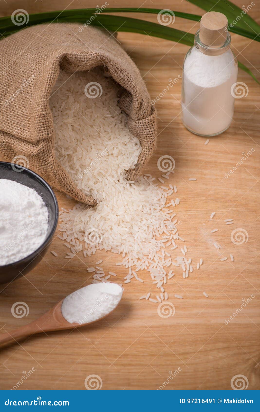 Jasmine White Rice in Sack and Rice Flour on Wooden Table. Stock Image ...