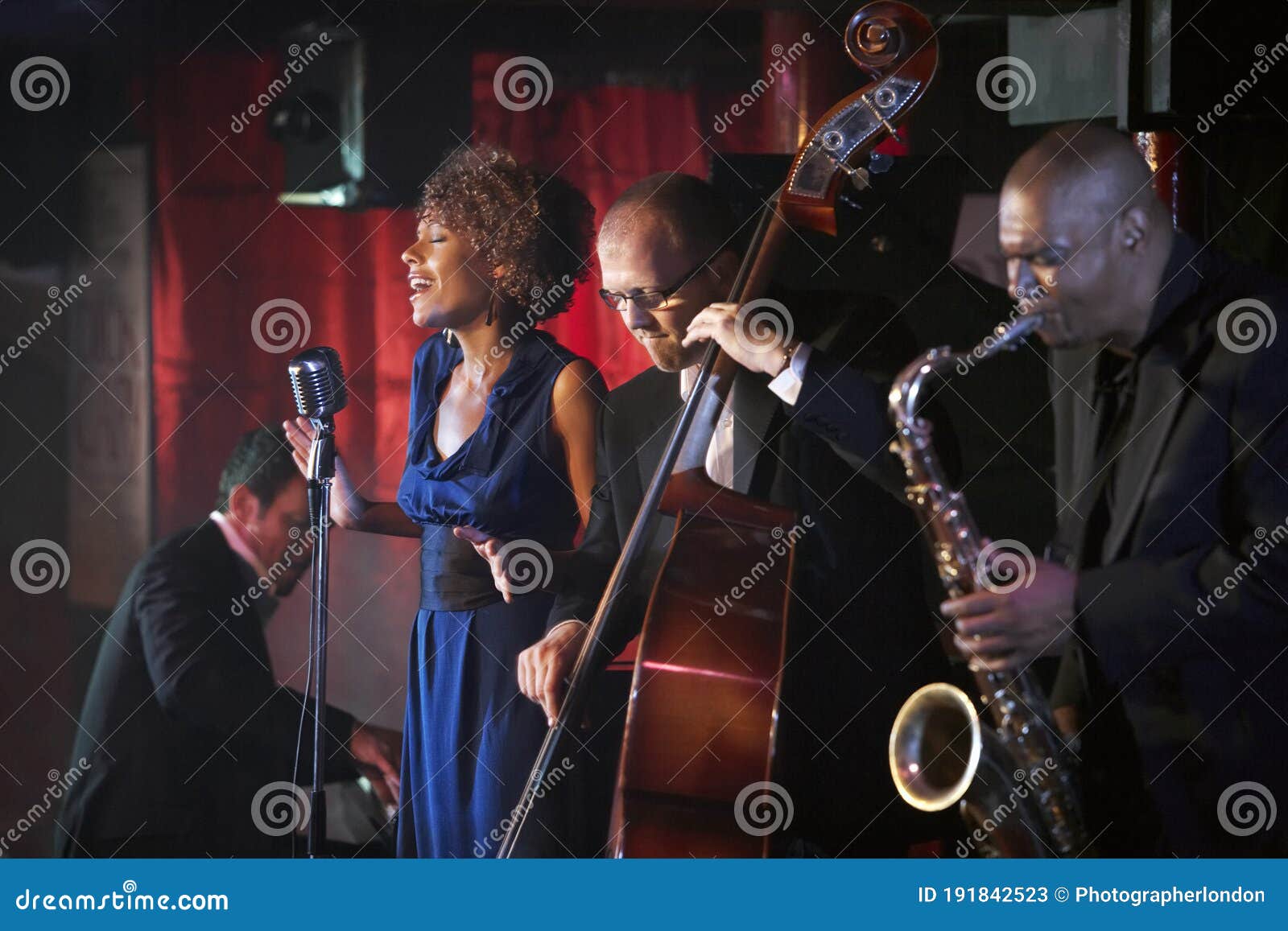 Jazz Band Performing in Nightclub Stock Image - Image of people, night ...
