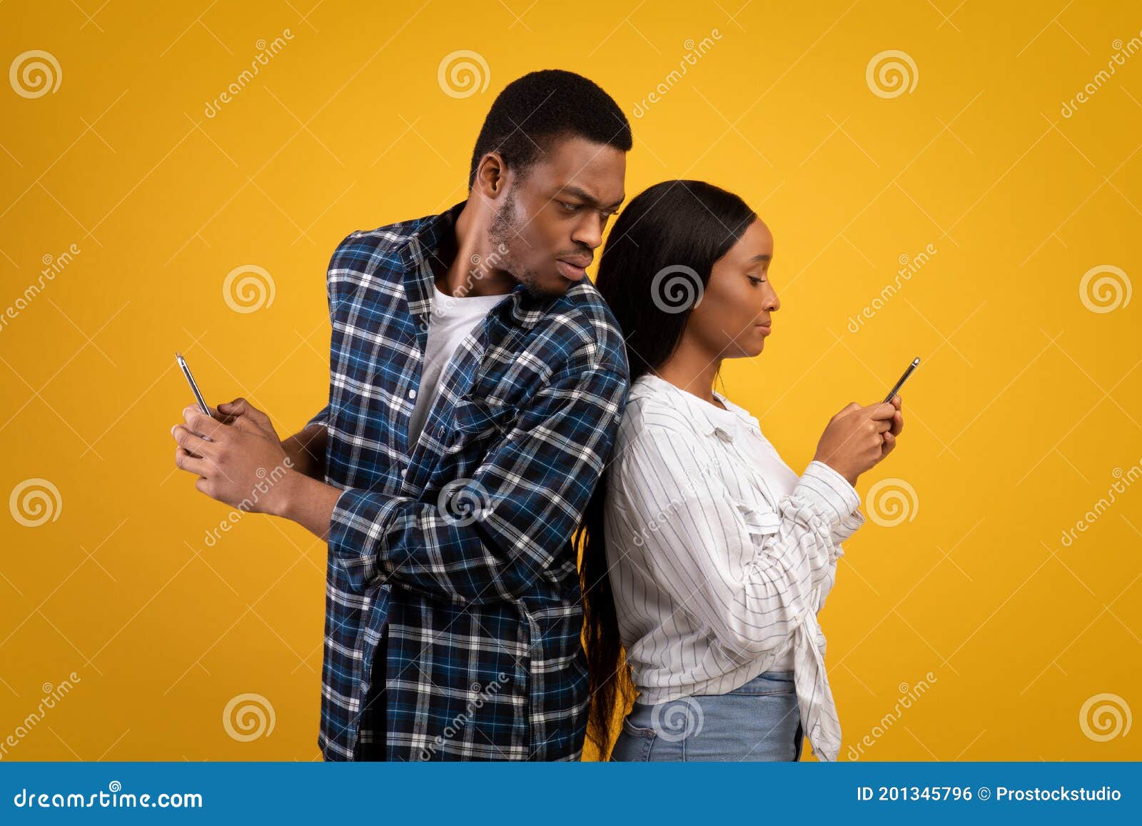 Strict Millennial African American Guy Look Wife In Casual Texting On