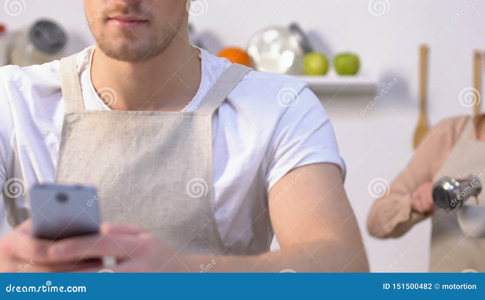 Jealous Wife Making Coffee And Peeping Her Husband Chatting On