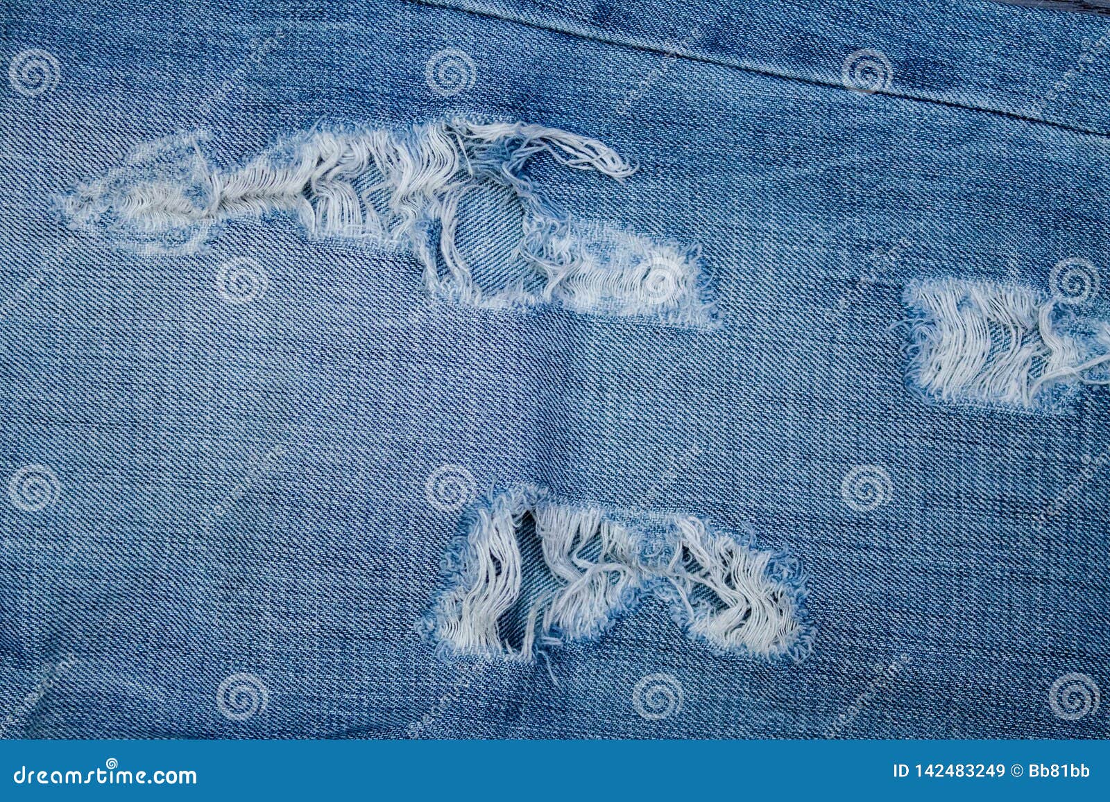 Blue Jean Texture with a Hole and Threads Stock Image - Image of blue ...