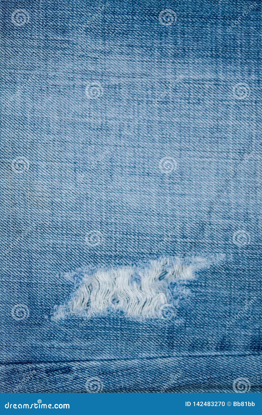 Blue Jean Texture with a Hole and Threads Stock Photo - Image of ripped ...