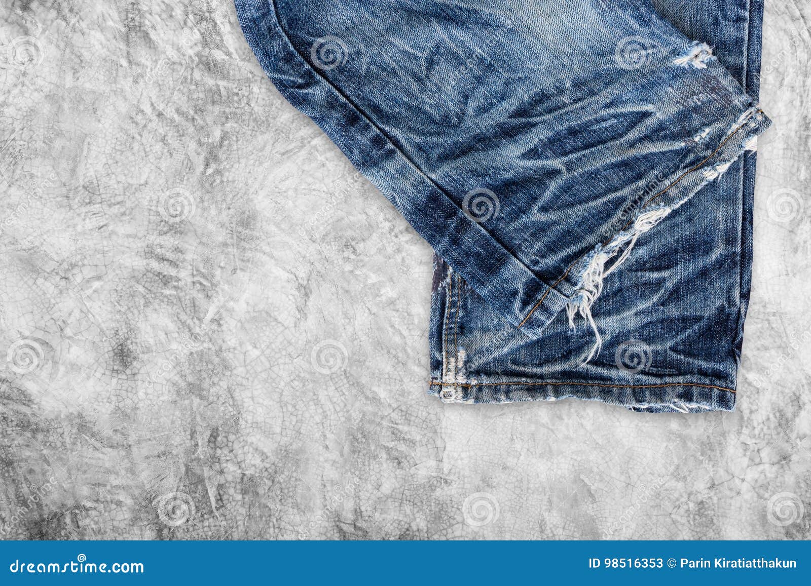 Jeans on concrete floor. stock image. Image of concrete - 98516353